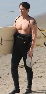 Retro Bikini: Rob Lowe Goes Surfing With “Tattoo” In Malibu Beach